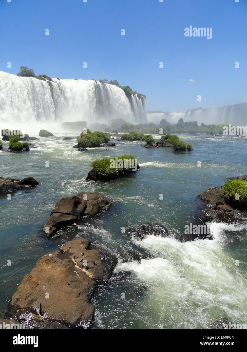 Iguazu Falls, one of the Natural Wonders of the World, on the border of ...