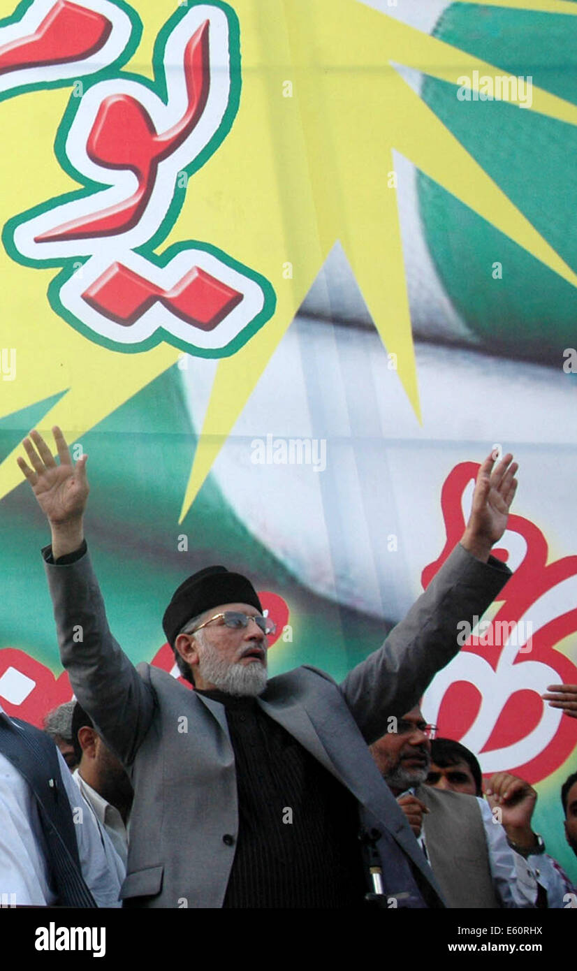 Lahore. 10th Aug, 2014. Pakistani religious leader Tahir-ul-Qadri waves ...