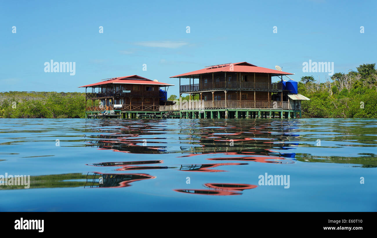 Caribbean hotel on stilts over water viewed from sea surface, Panama ...