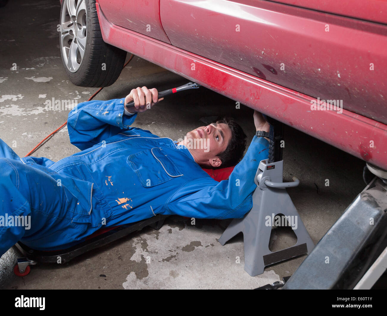 Man repairing a car hi-res stock photography and images - Alamy