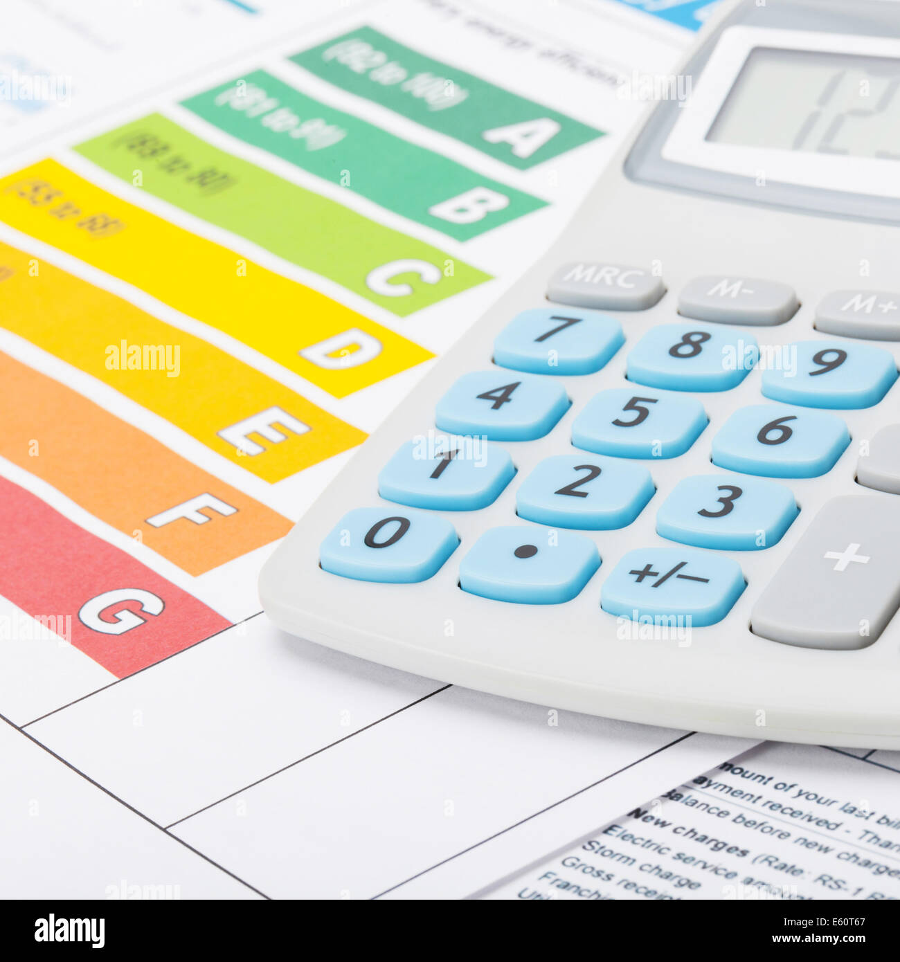 Energy efficiency chart with calculator - studio shot Stock Photo - Alamy
