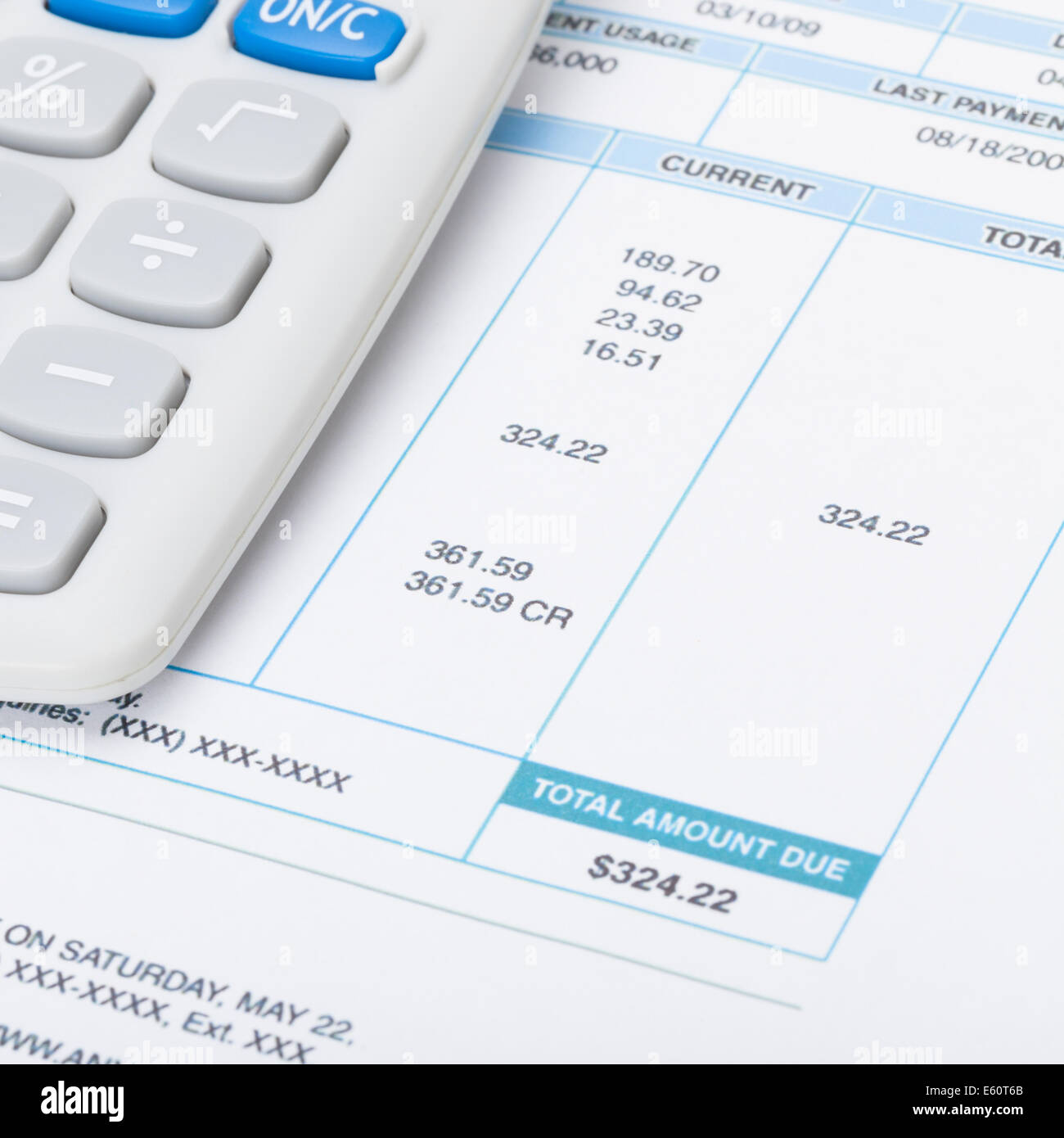 Receipt next to calculator over it - studio shot - 1 to 1 ratio Stock ...