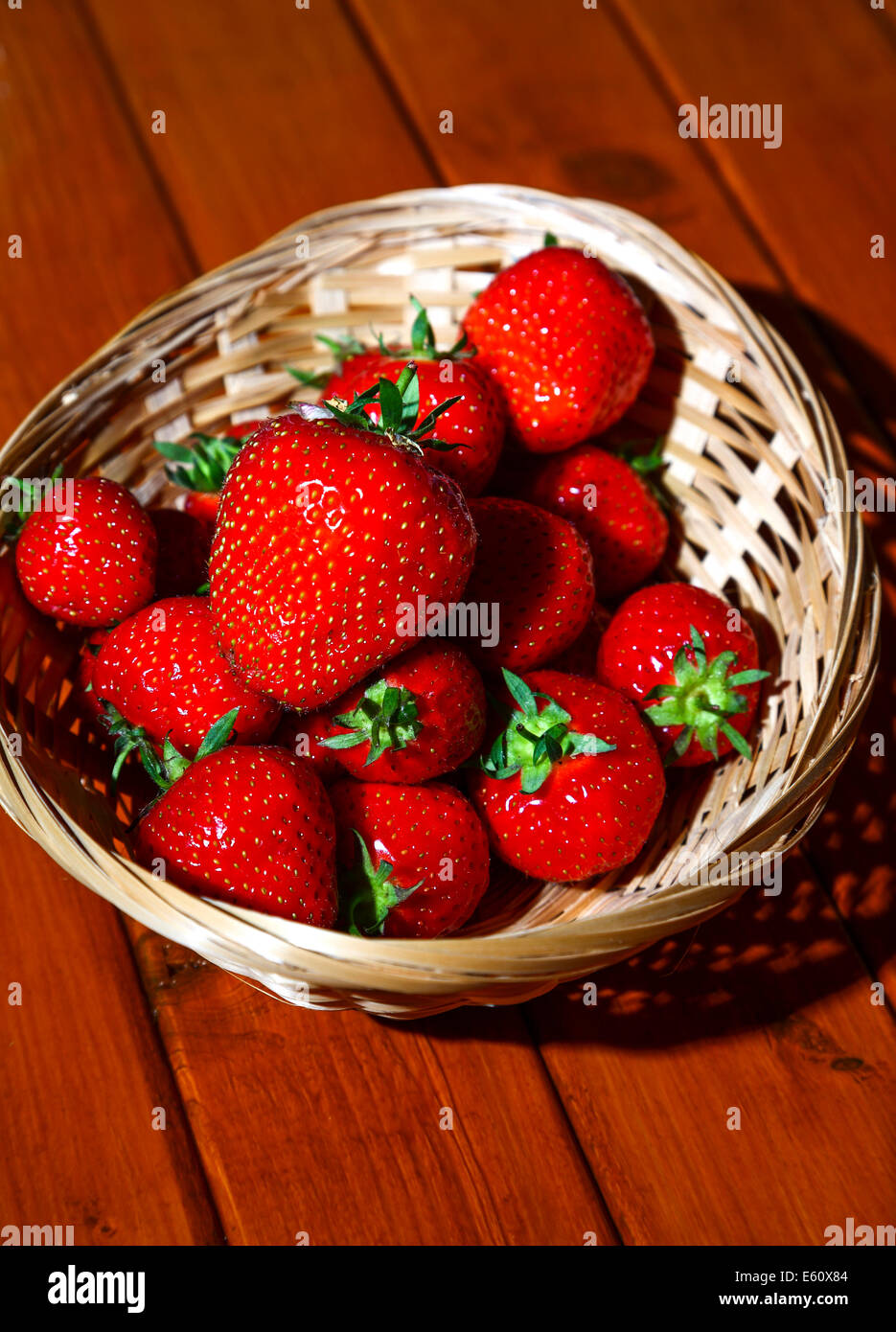 Strawberries in a basket Stock Photo - Alamy