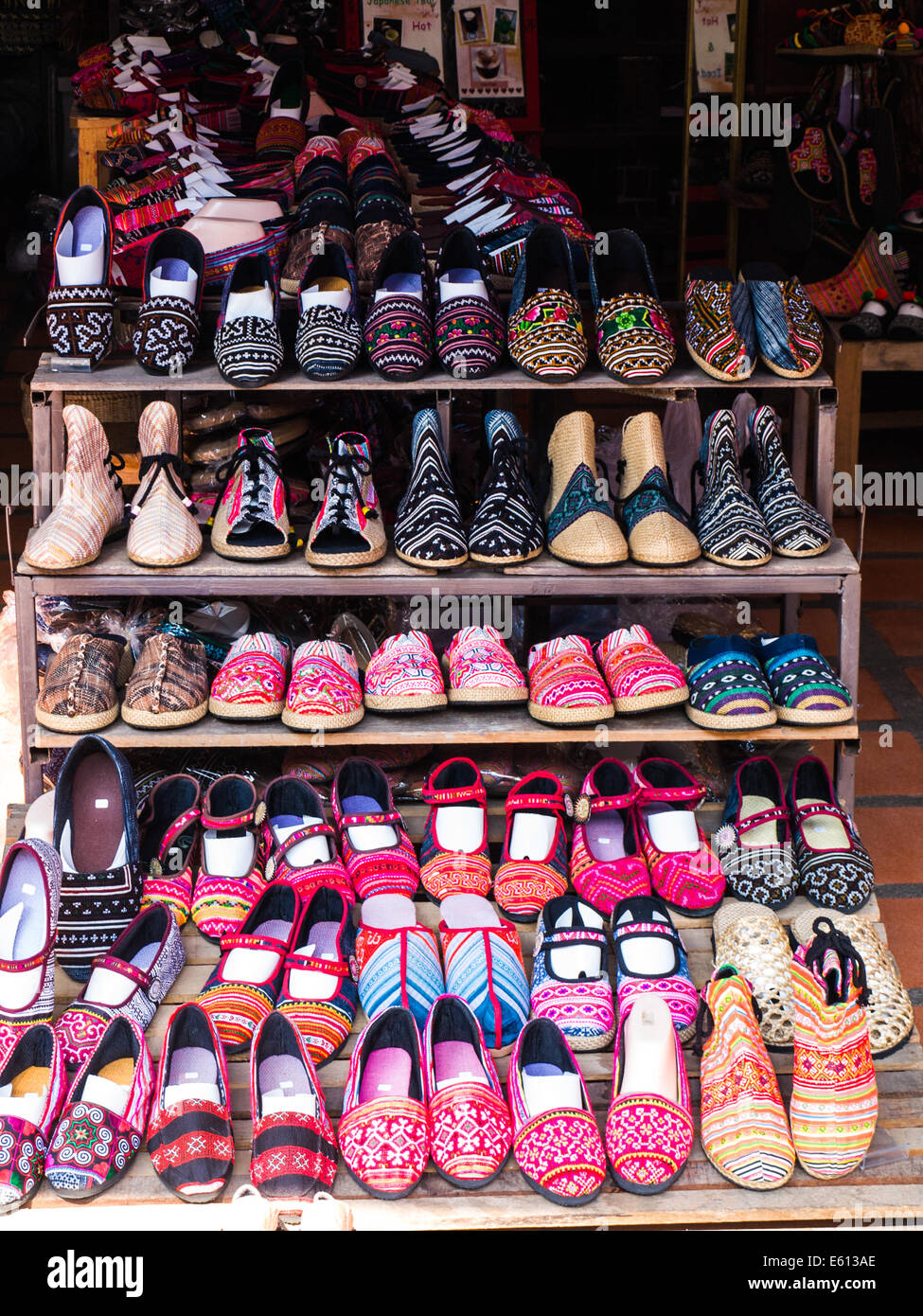 Colorful hill tribe fabric shoes in market in Chiang Mai, Thailand ...