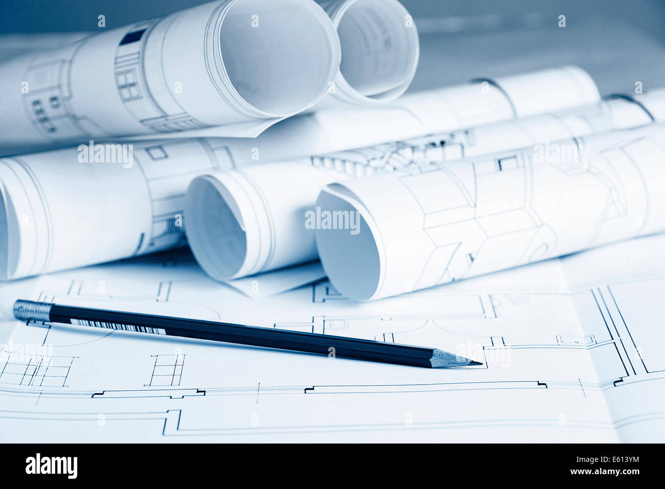 Blueprints and pencil on blue tone Stock Photo - Alamy