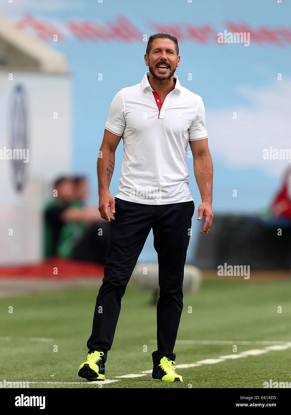 Madrid's coach Diego Simeone reacts during the soccer test match VfL ...