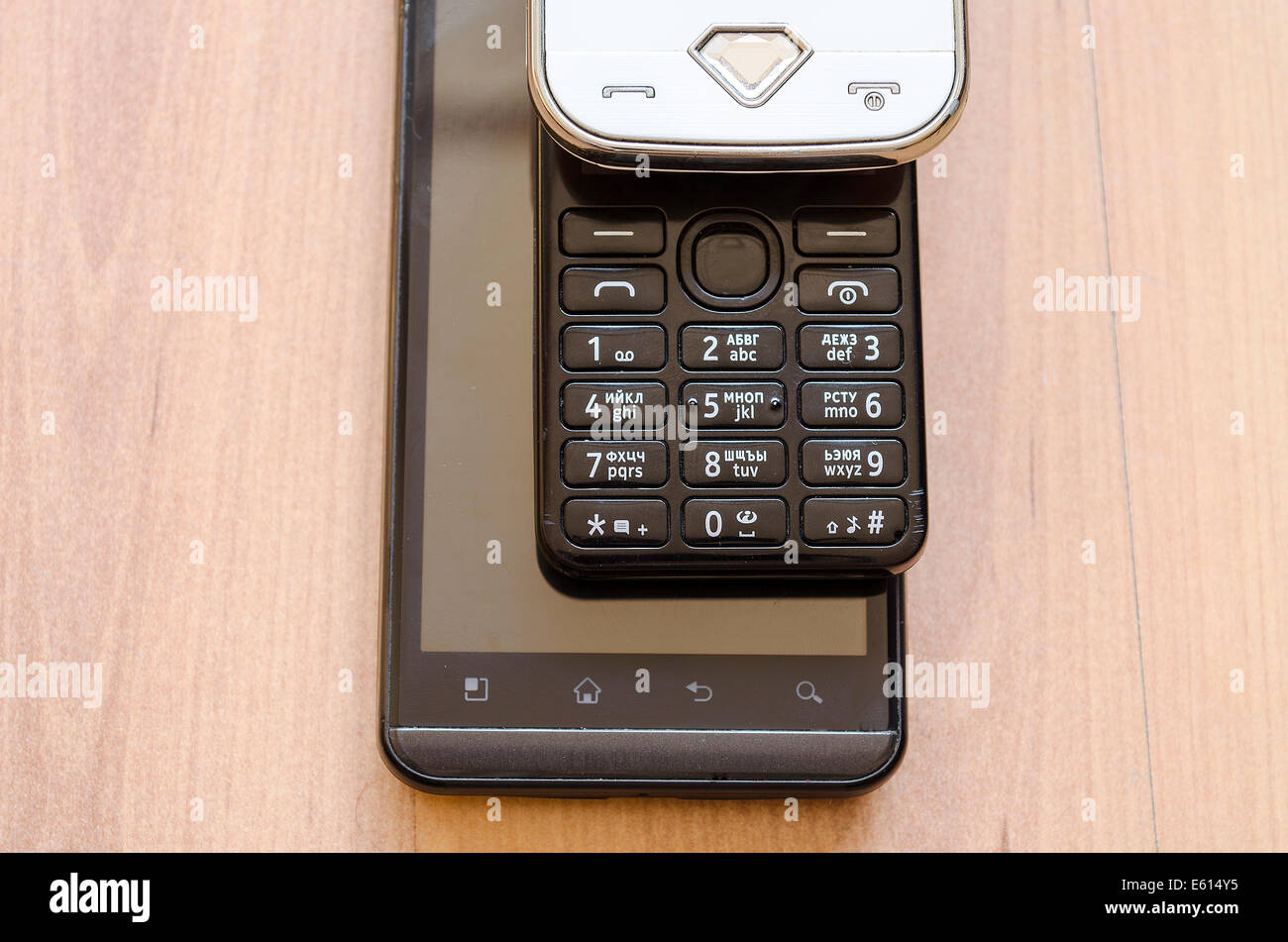 Mobile Telephones - smartphone and old mobile telephone Stock Photo - Alamy