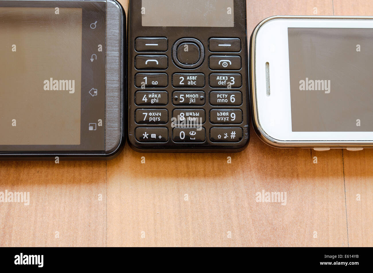 Mobile Telephones - smartphone and old mobile telephone Stock Photo - Alamy