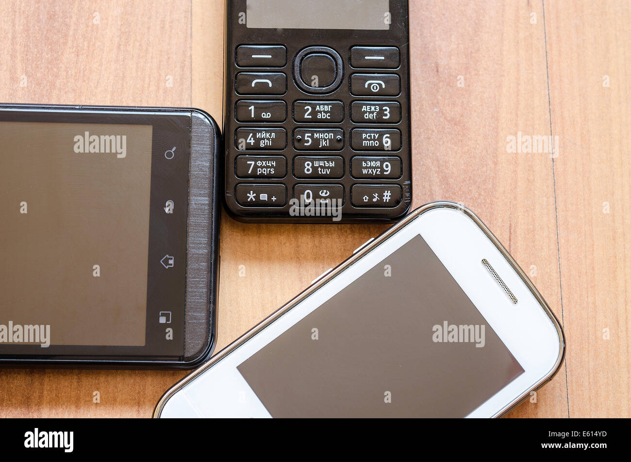 Mobile Telephones - smartphone and old mobile telephone Stock Photo - Alamy