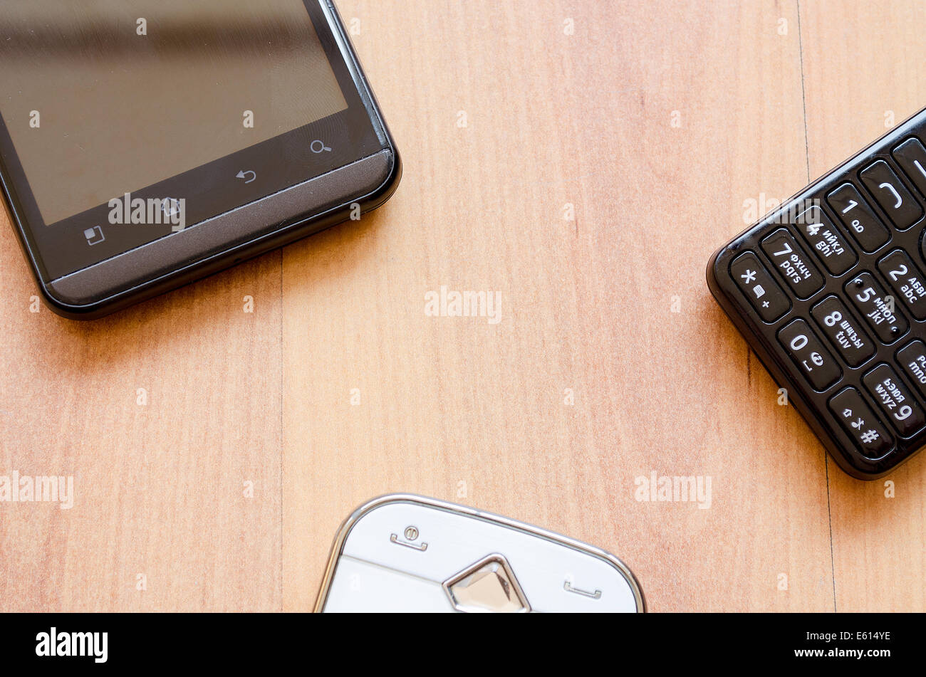 Mobile Telephones - smartphone and old mobile telephone Stock Photo - Alamy