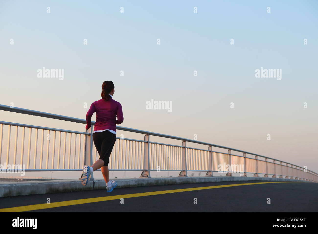 Young Japanese girl jogging Stock Photo - Alamy