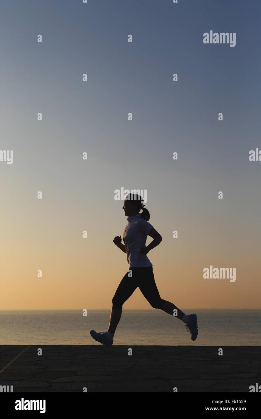 Young Japanese girl jogging Stock Photo - Alamy
