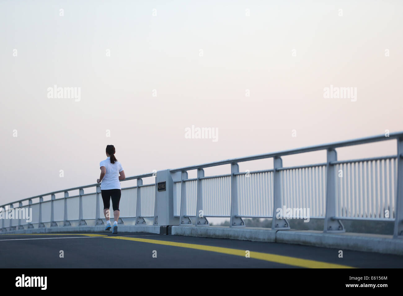 Young Japanese girl jogging Stock Photo - Alamy
