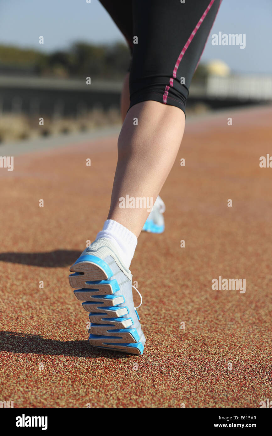 Young Japanese girl jogging Stock Photo - Alamy
