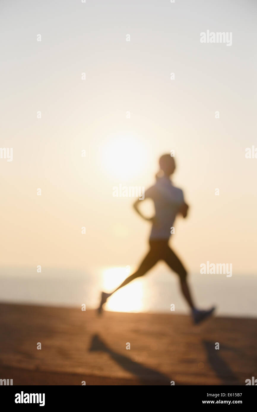 Young Japanese girl jogging Stock Photo - Alamy