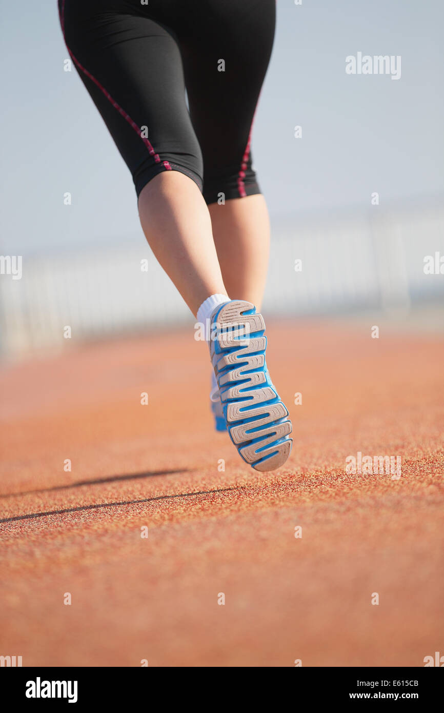 Young Japanese girl jogging Stock Photo - Alamy