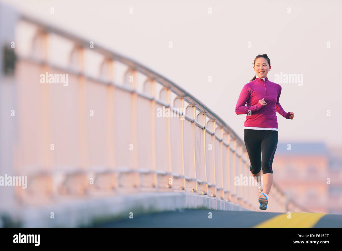 Young Japanese girl jogging Stock Photo - Alamy