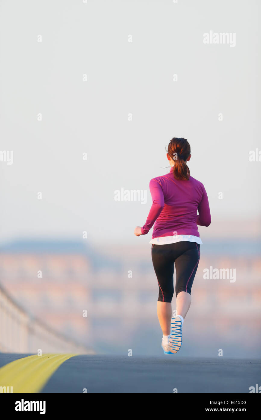Young Japanese girl jogging Stock Photo - Alamy