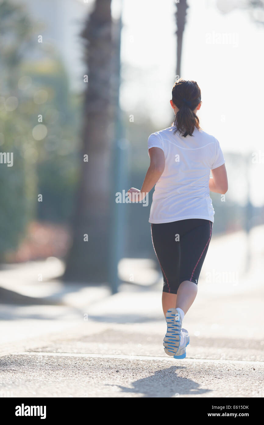 Young Japanese girl jogging Stock Photo - Alamy