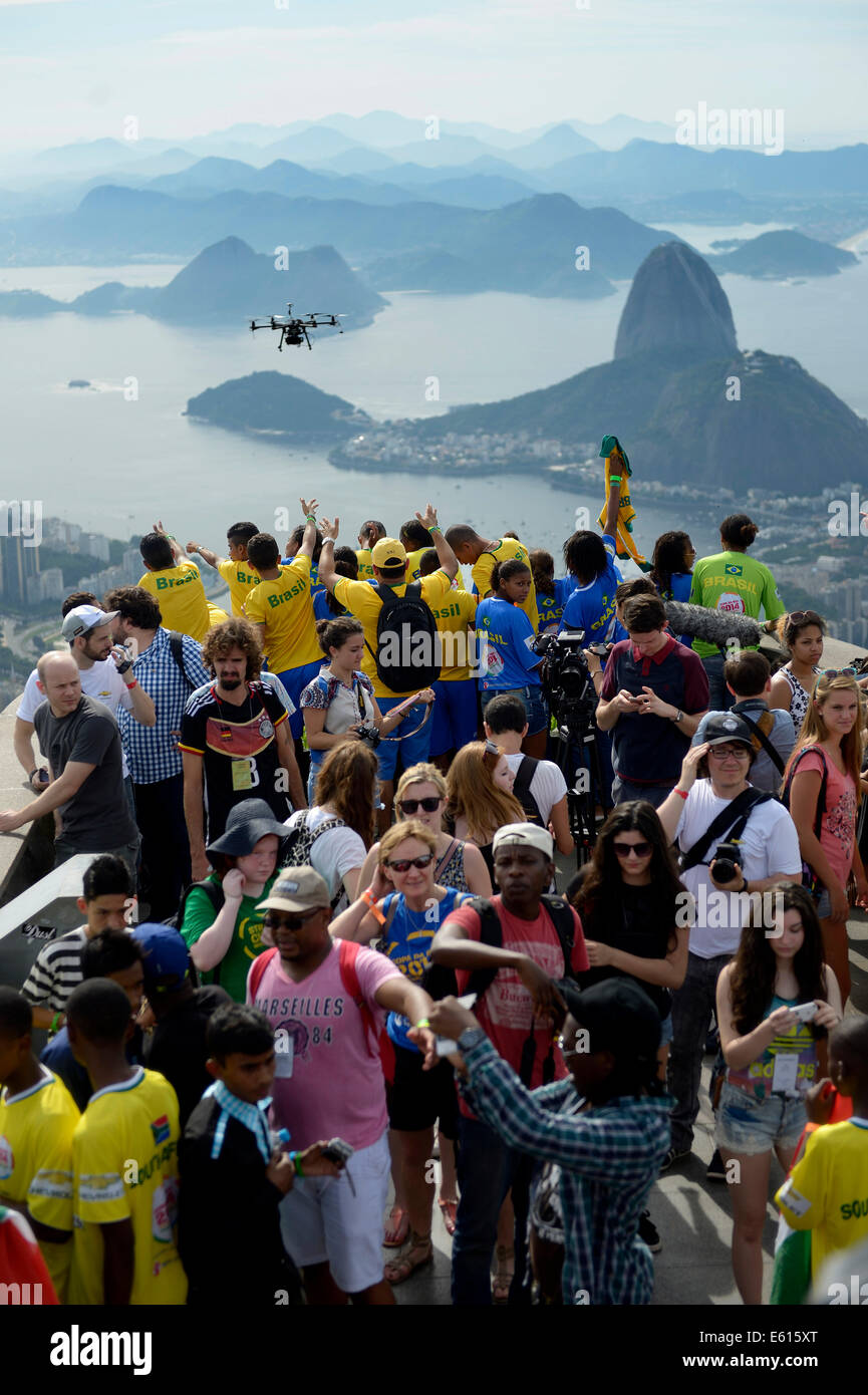 People cheering in the direction of a drone with cameras, Octopoter, on ...