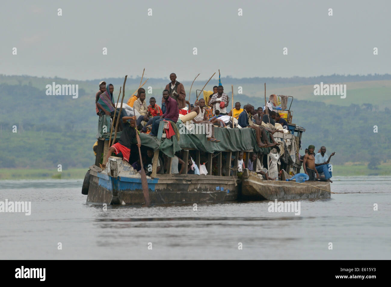 Overloaded boat on the Congo River, near Tshumbiri, Bandundu Province ...