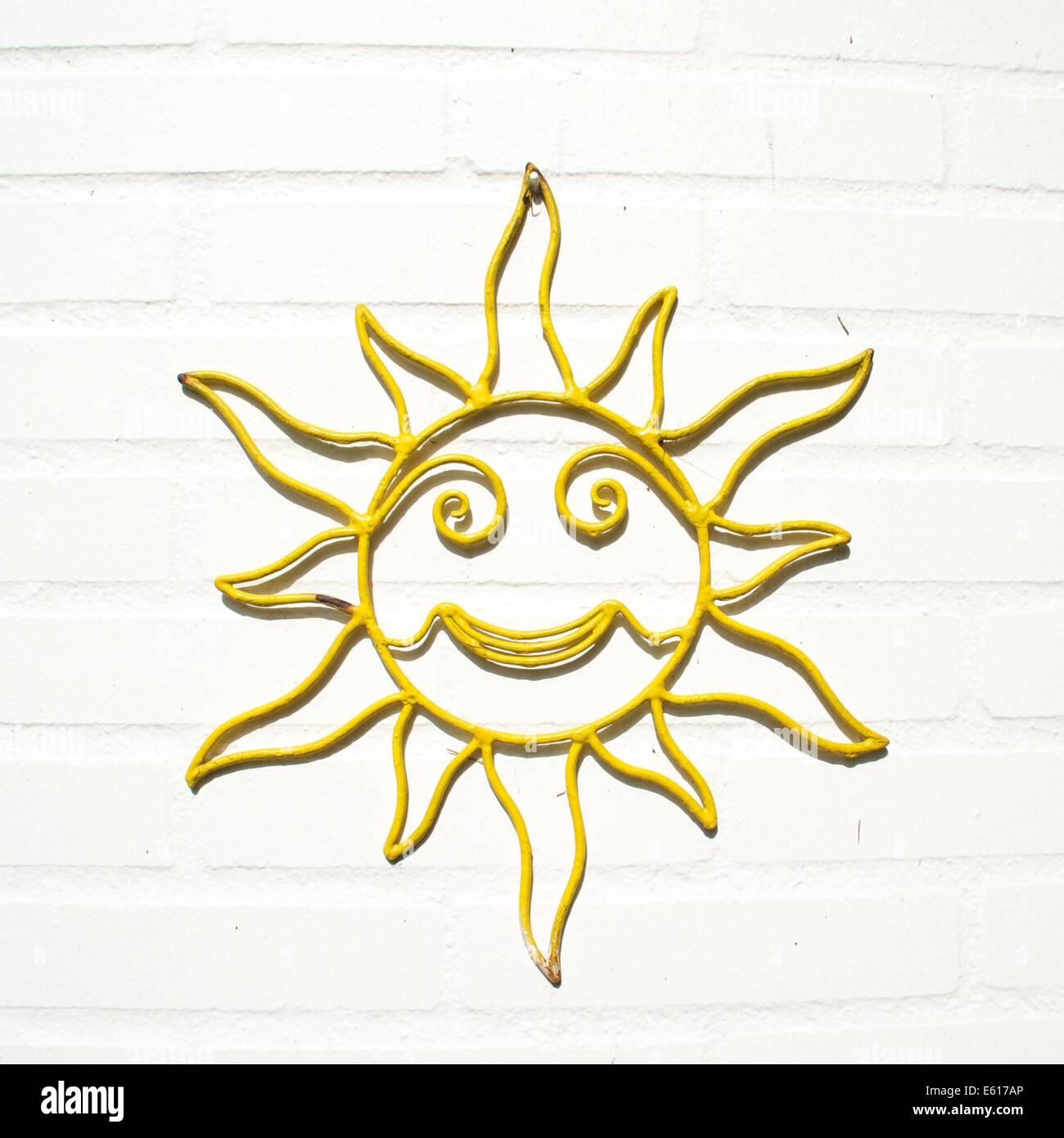 Yellow happy smiley sun hi-res stock photography and images - Alamy