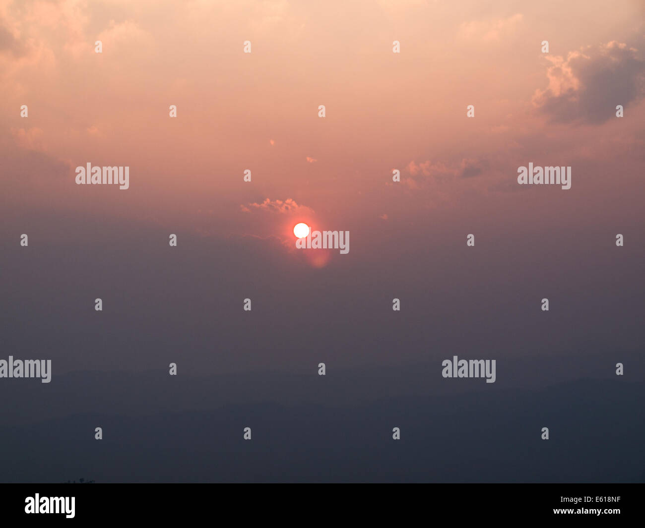 Stunning sunset golden sky Stock Photo - Alamy