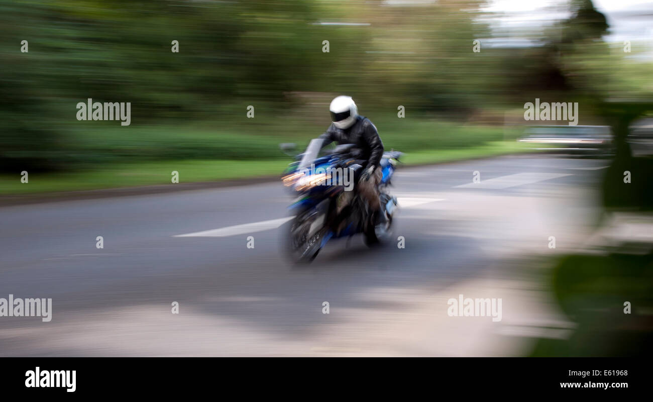Motorcycle at speed Stock Photo - Alamy