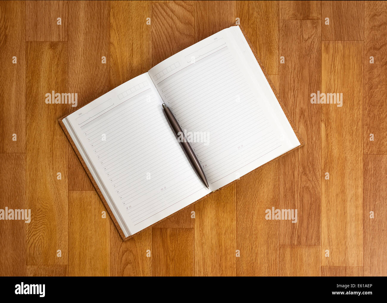 Blank notepad with office supplies on wooden table. Above view Stock ...