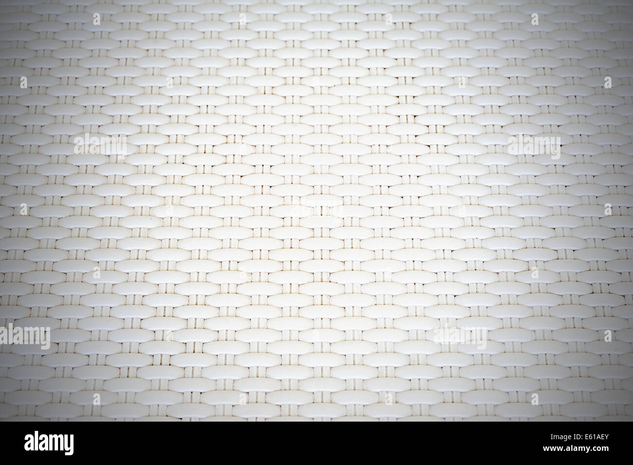 White cream plastic surface with repeating pattern. For use as ...