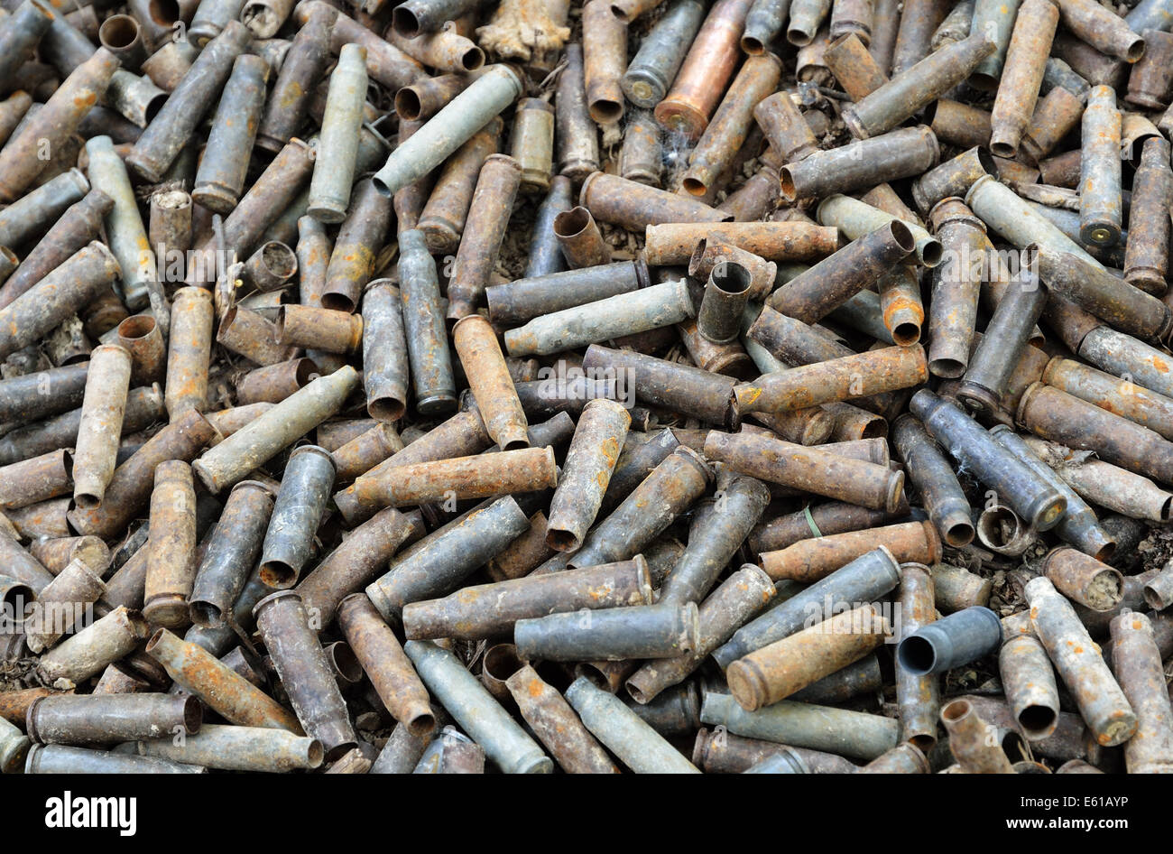 War background of used shells Stock Photo - Alamy