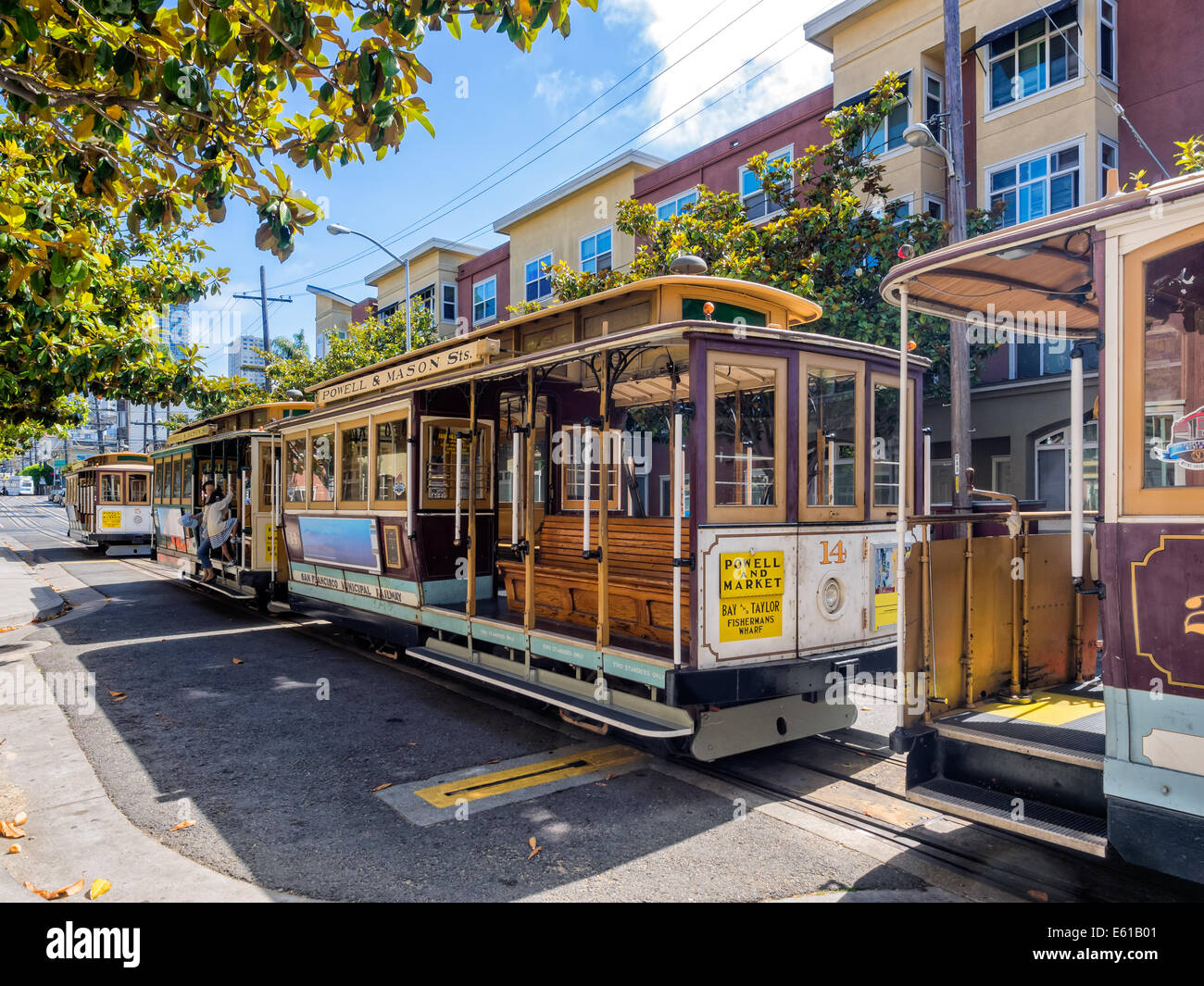 Public cable cars in San Francisco streets, USA Stock Photo - Alamy