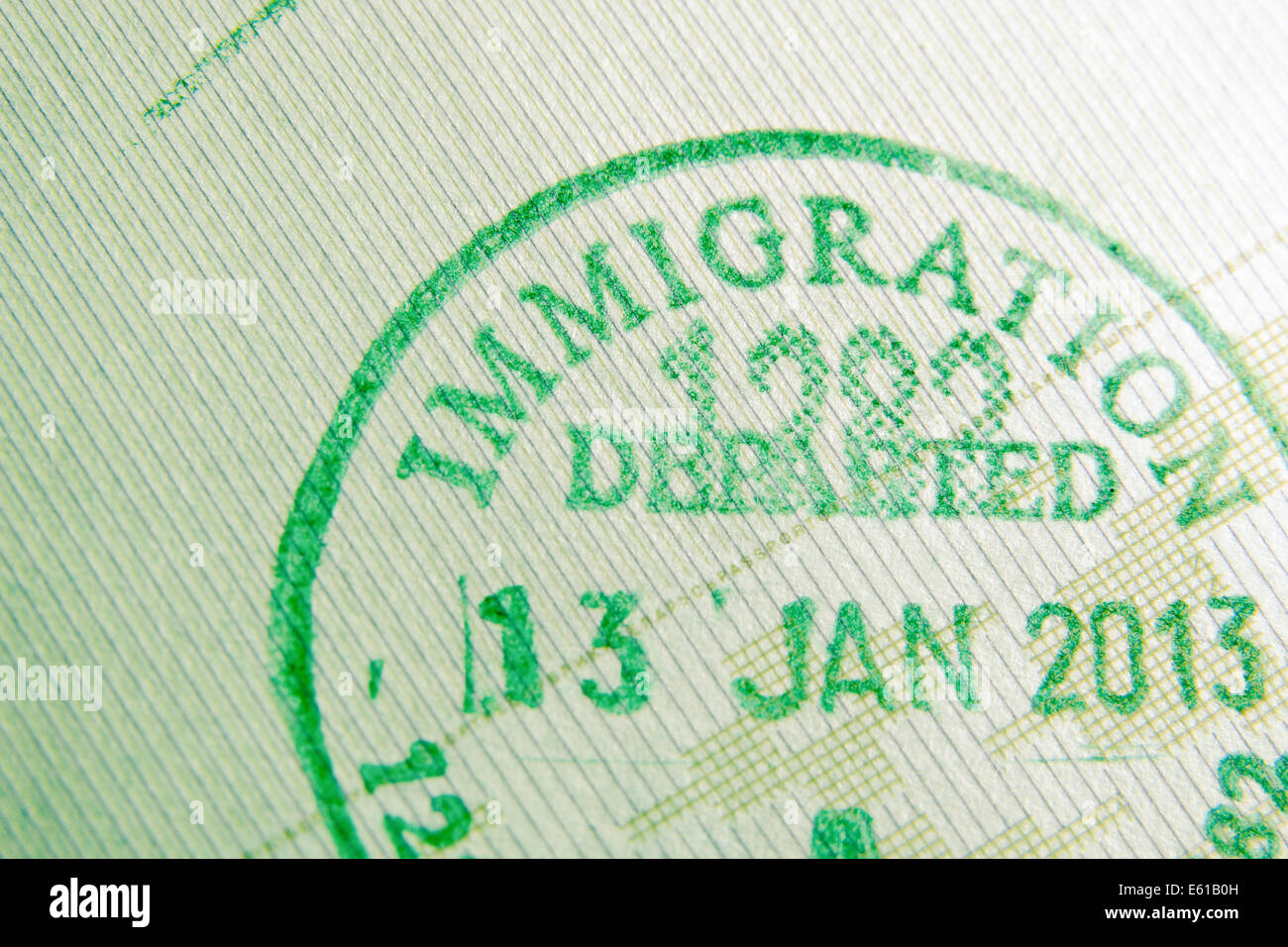 immigration control passport stamp fragment; focus on Immigration word ...