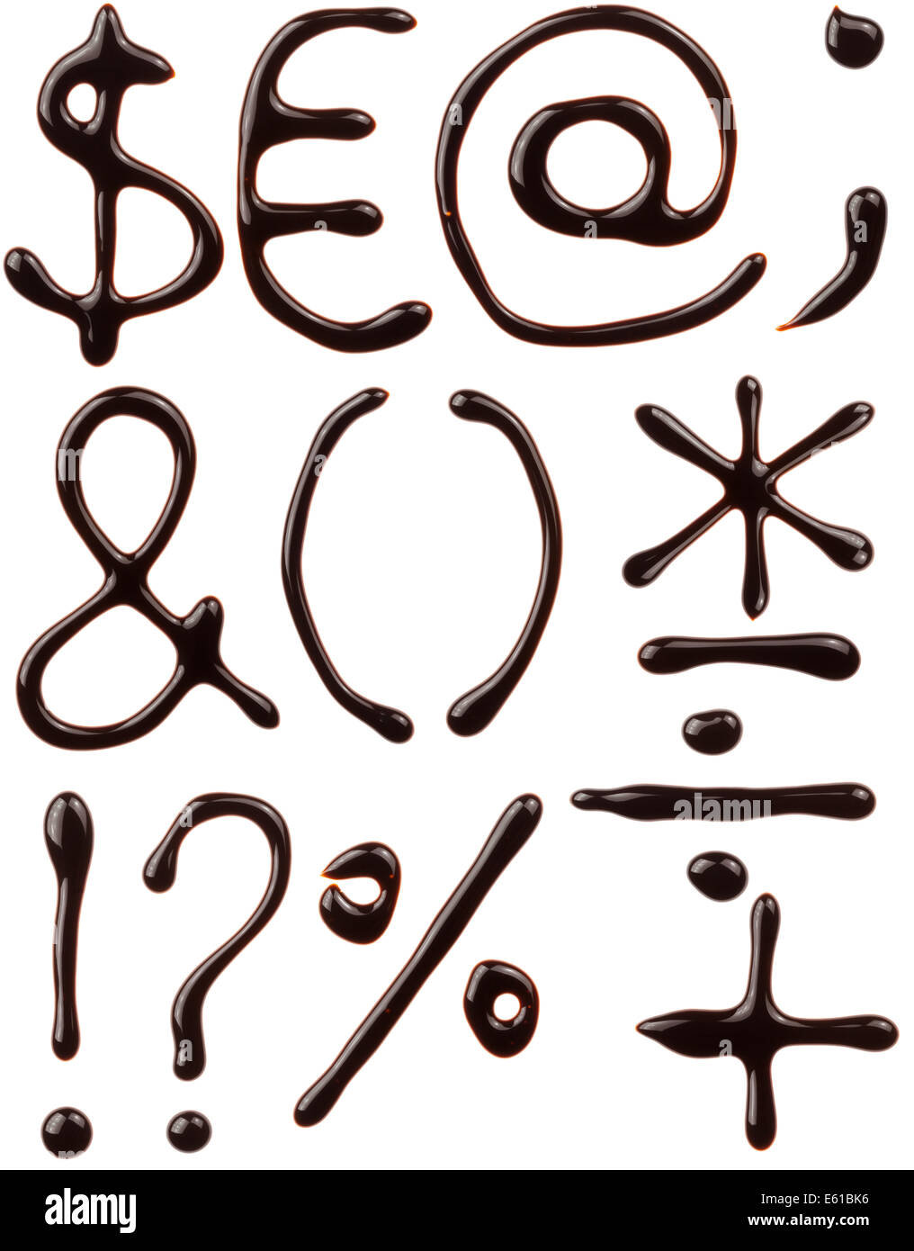 Symbols set written with chocolate syrup Stock Photo - Alamy
