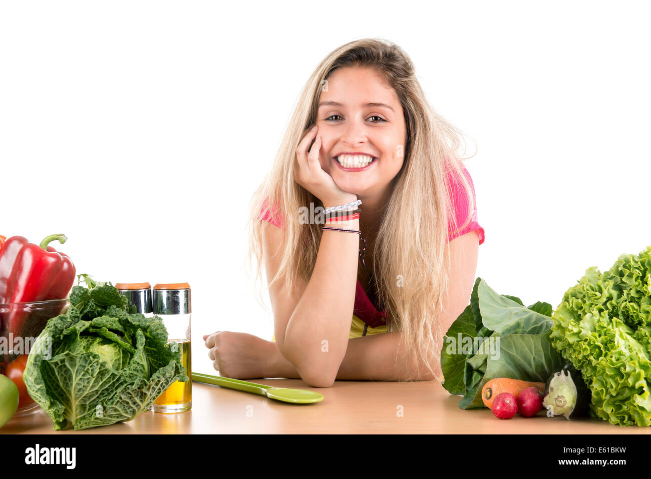 Beautiful woman cooking in the kitchen Stock Photo - Alamy