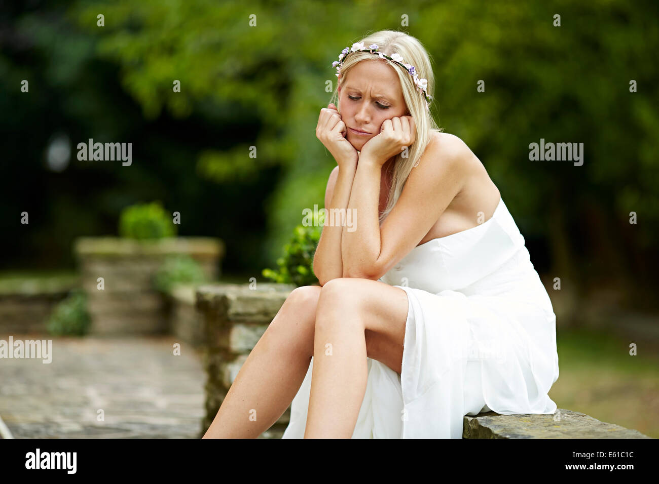 Unhappy bride at a wedding Stock Photo - Alamy
