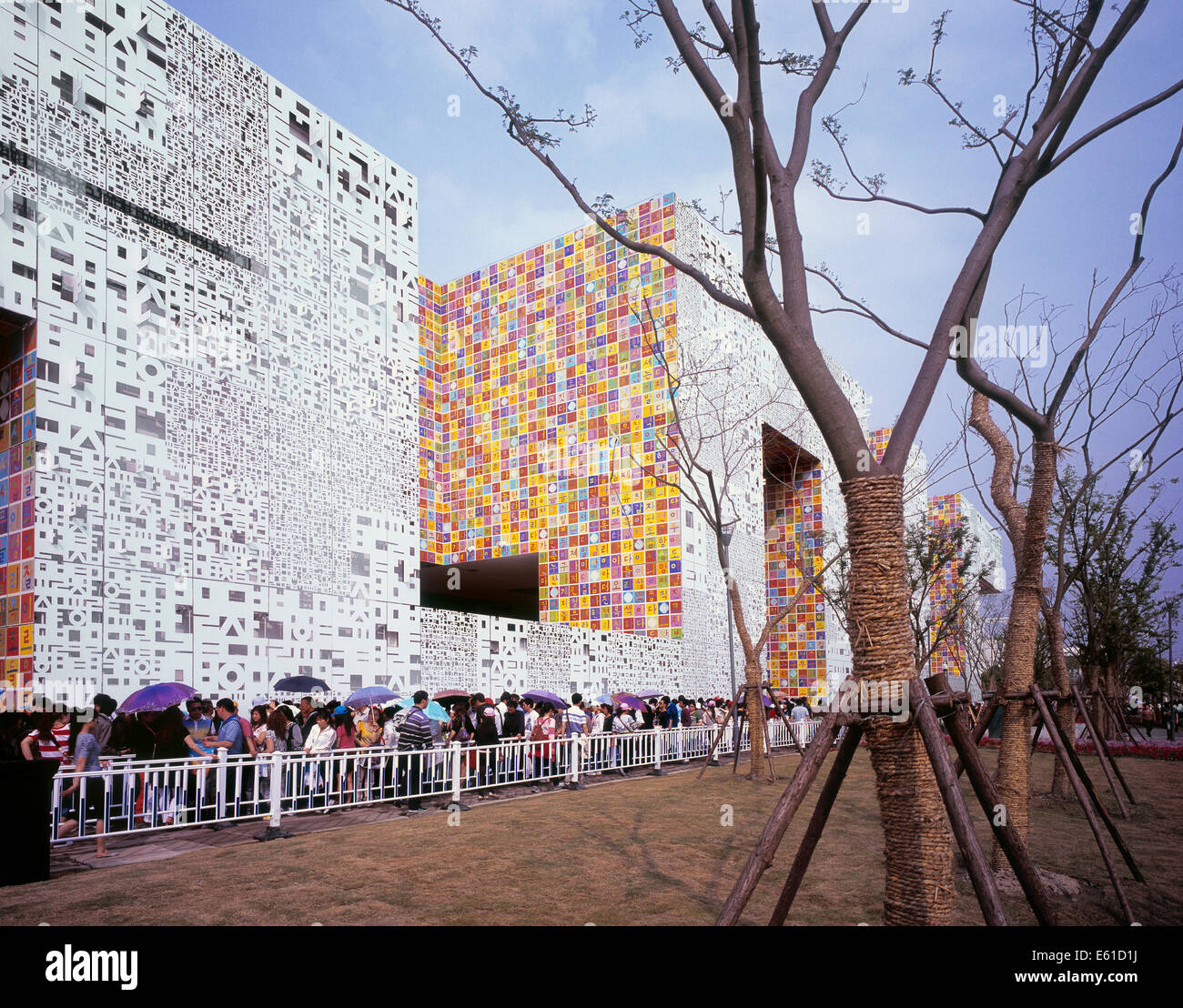 People waiting in a long queue to enter the South Korean Pavilion at ...