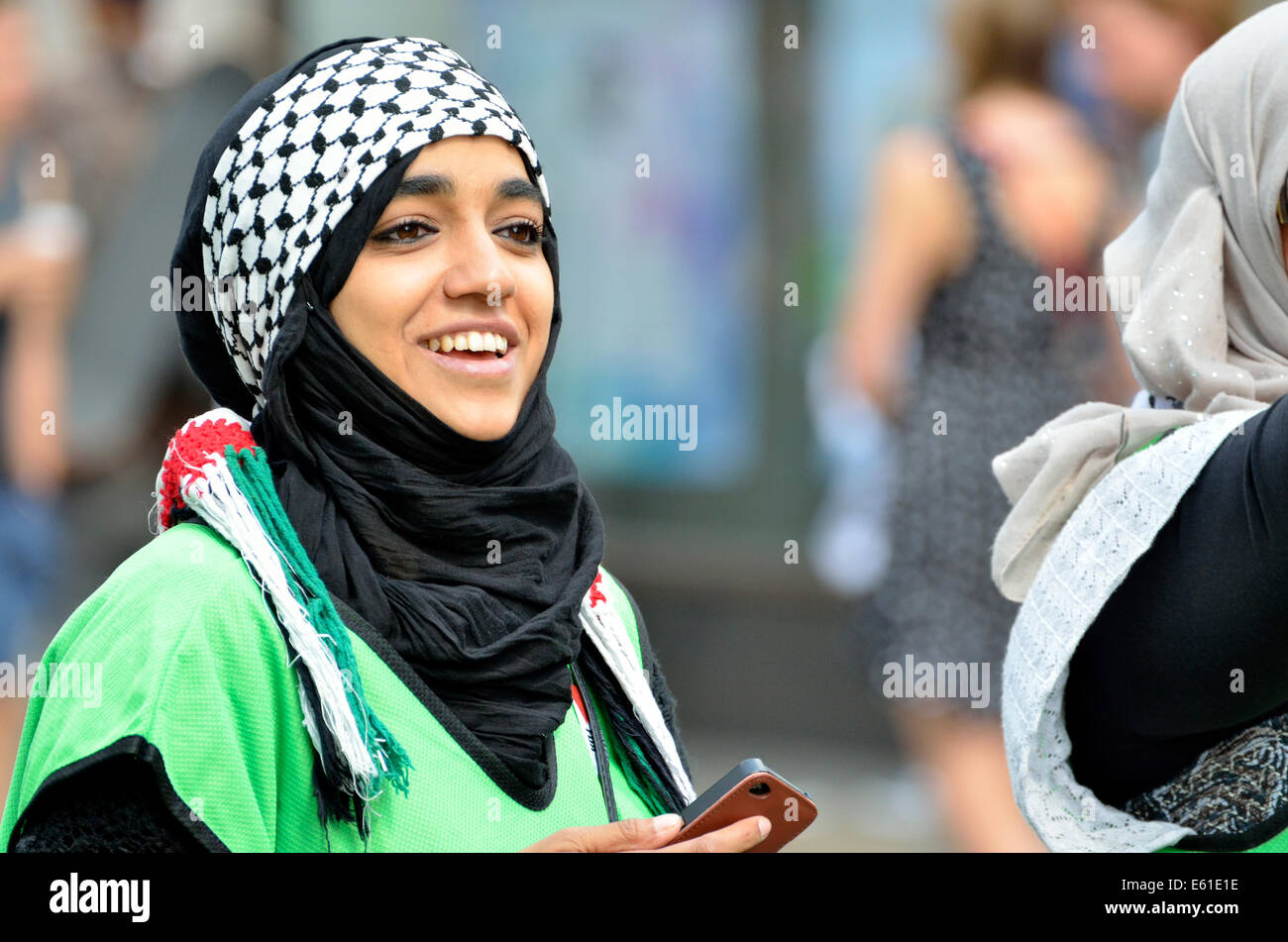 Young woman dressed in the colours of the Palestinian flag at the March ...