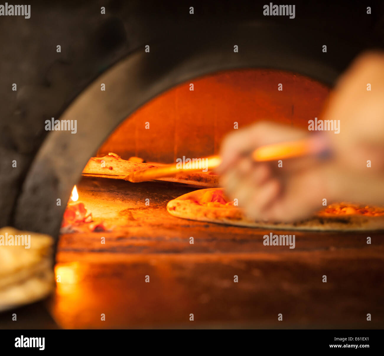 Pizza baking close up in the oven Stock Photo - Alamy
