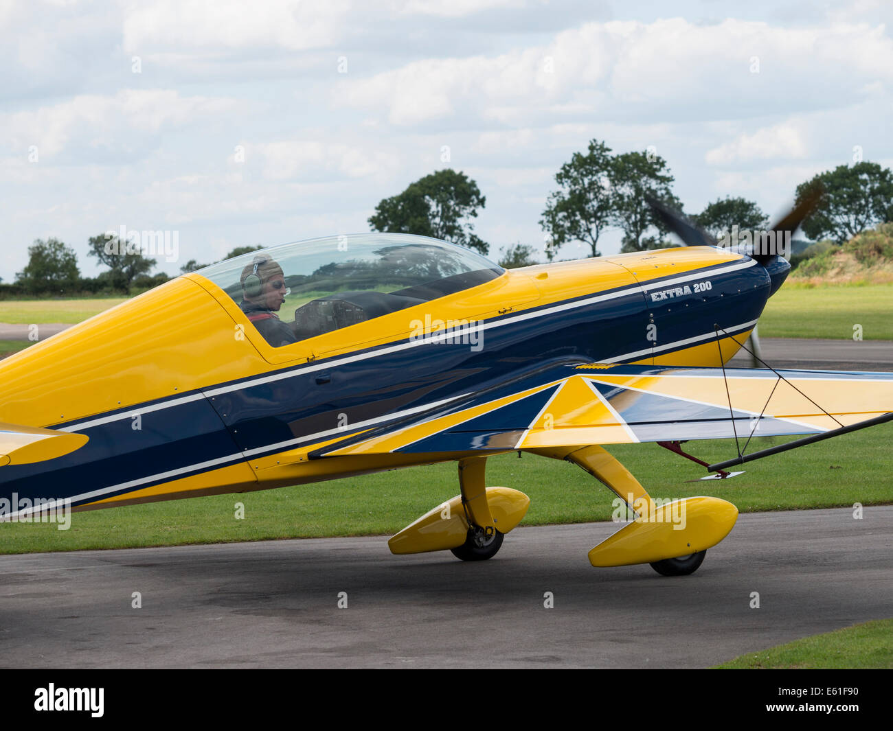 An Extra 200 aerobatic stunt aircraft at Breighton airfield, Yorkshire ...