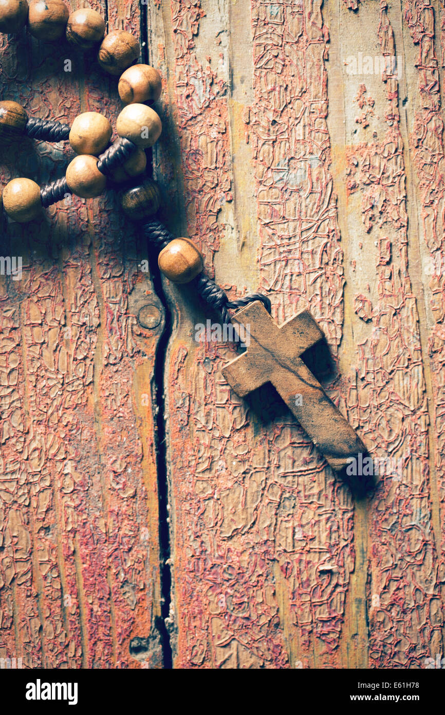 the rosary on old wooden table Stock Photo - Alamy
