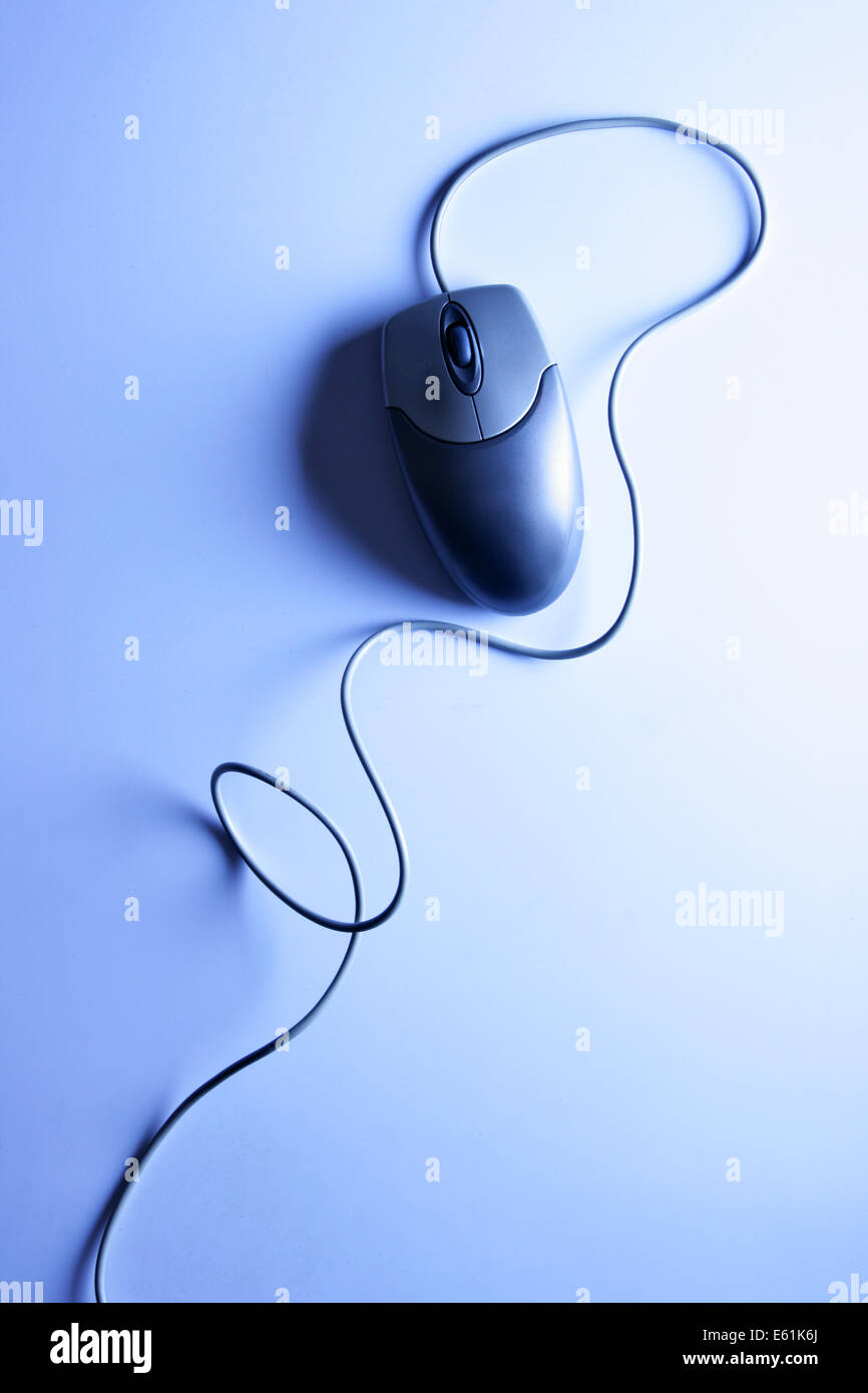 Optical mouse with long cord toned in blue color Stock Photo - Alamy