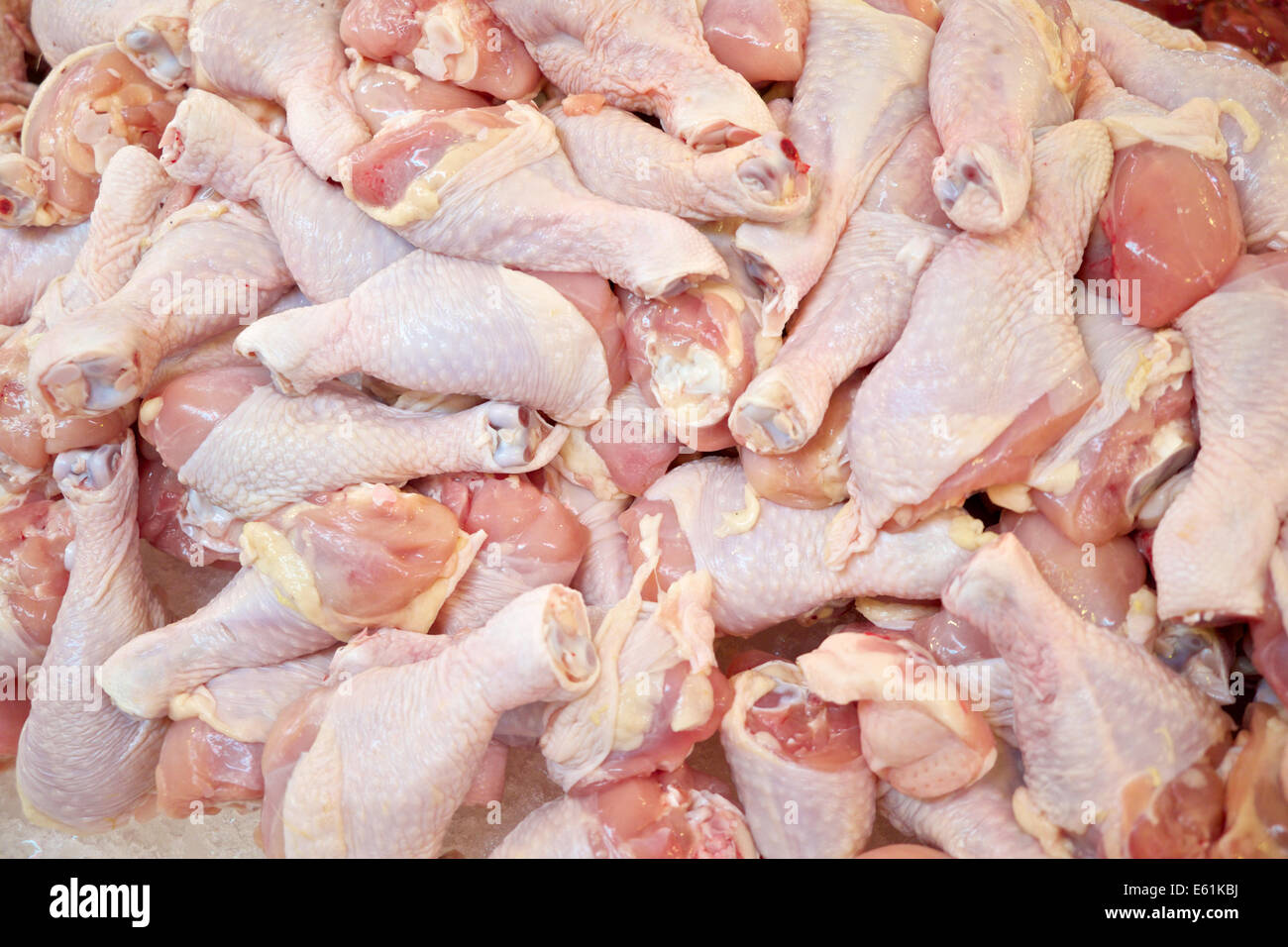 Raw Chicken Legs in Market Stock Photo - Alamy