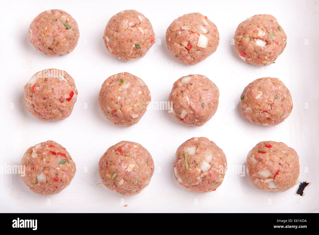 not cooked little beef meatballs Stock Photo - Alamy