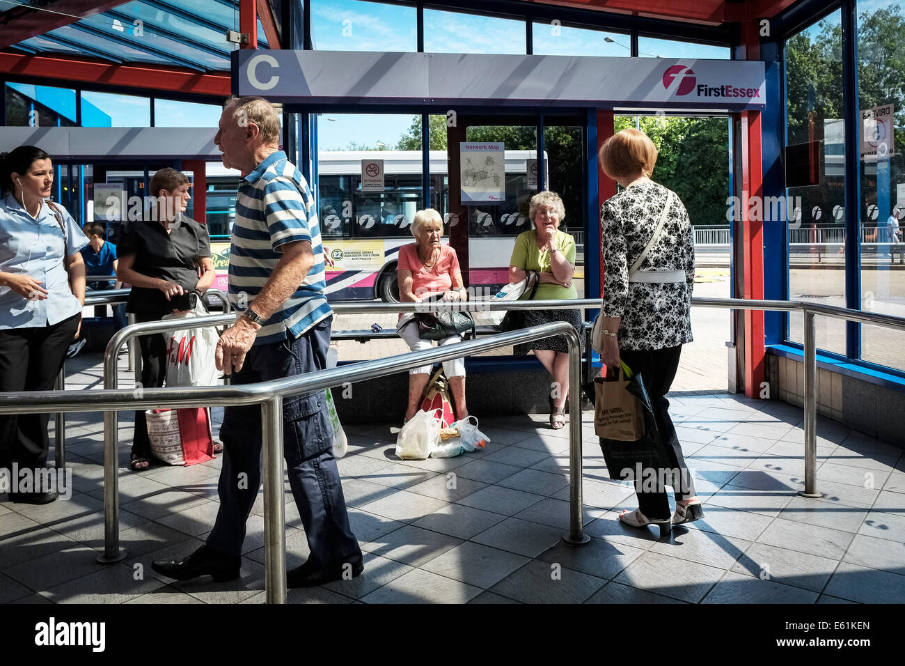 People waiting in Basildon Bus Station Stock Photo - Alamy