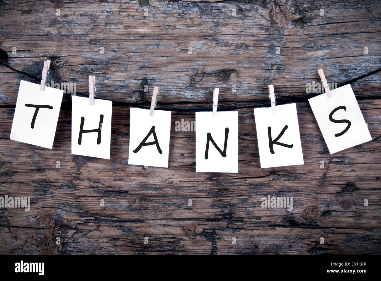 The Word Thanks on White Labels on Wood Stock Photo - Alamy