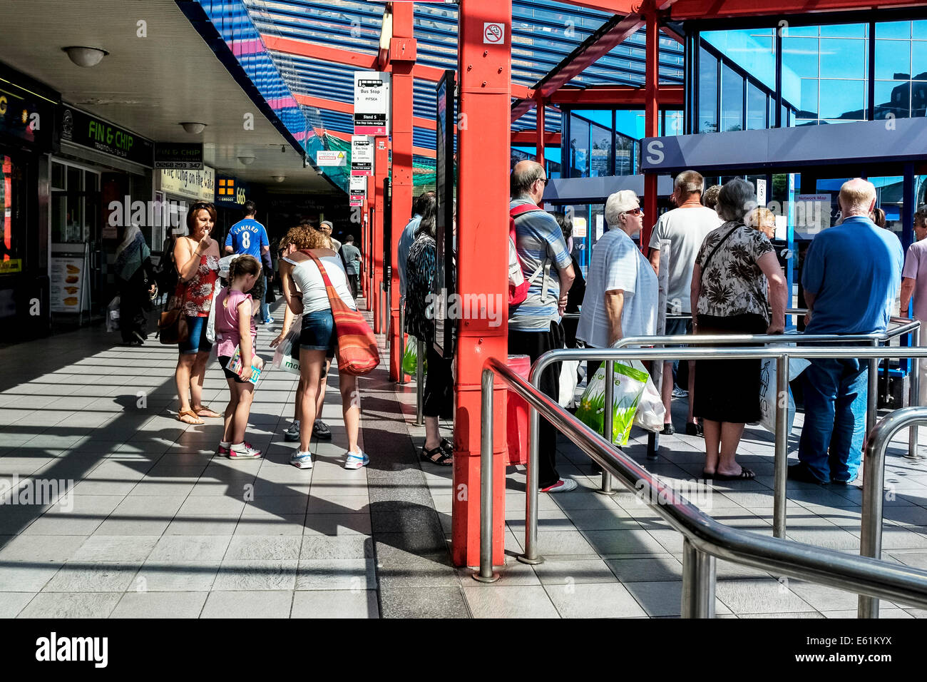 People queueing in Basildon Bus Station Stock Photo - Alamy