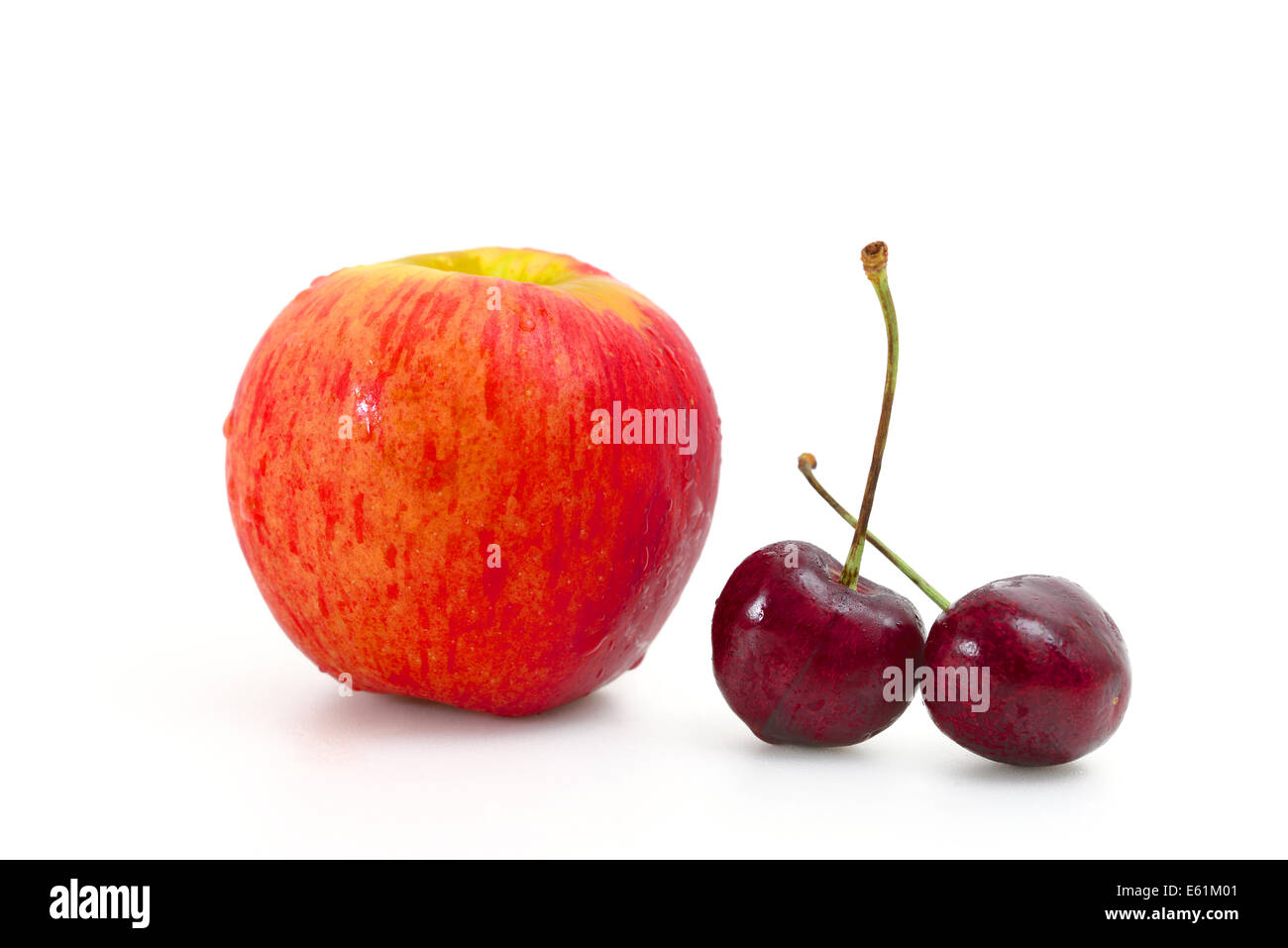 red apple with cherry Stock Photo - Alamy