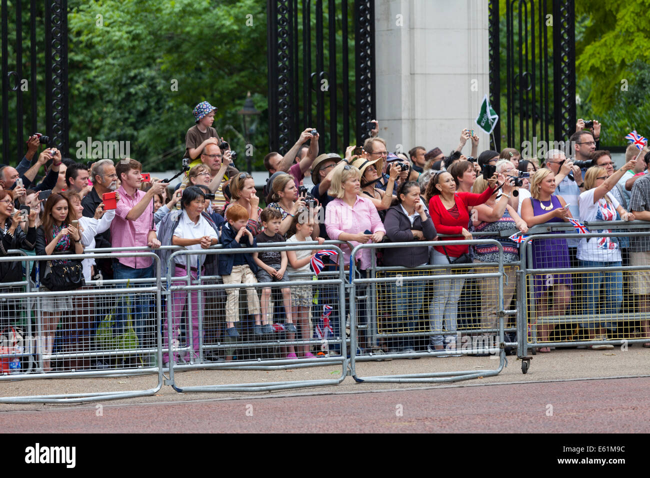 Watching parade hi-res stock photography and images - Alamy