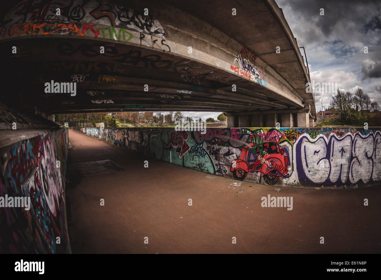 Graffiti street art under road bridge Stock Photo - Alamy